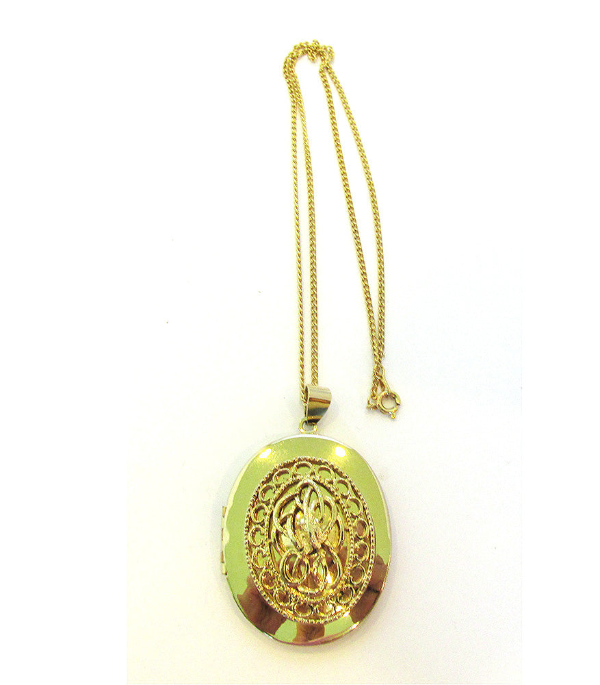 Dramatic 1950s Dramatic Mid-Century Oval Gold Locket and Chain